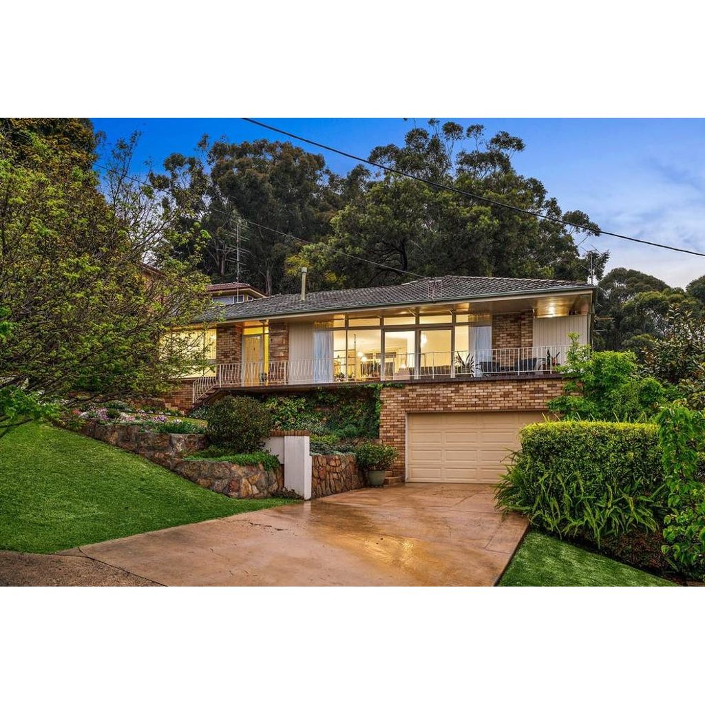Under the hammer: Mount Ousley home sells after 62 years in the same family