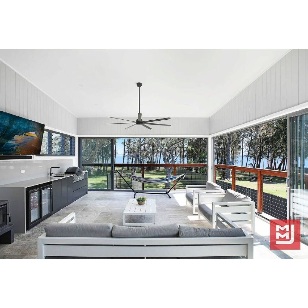 Luxury waterfront home smashes suburb price record for Primbee