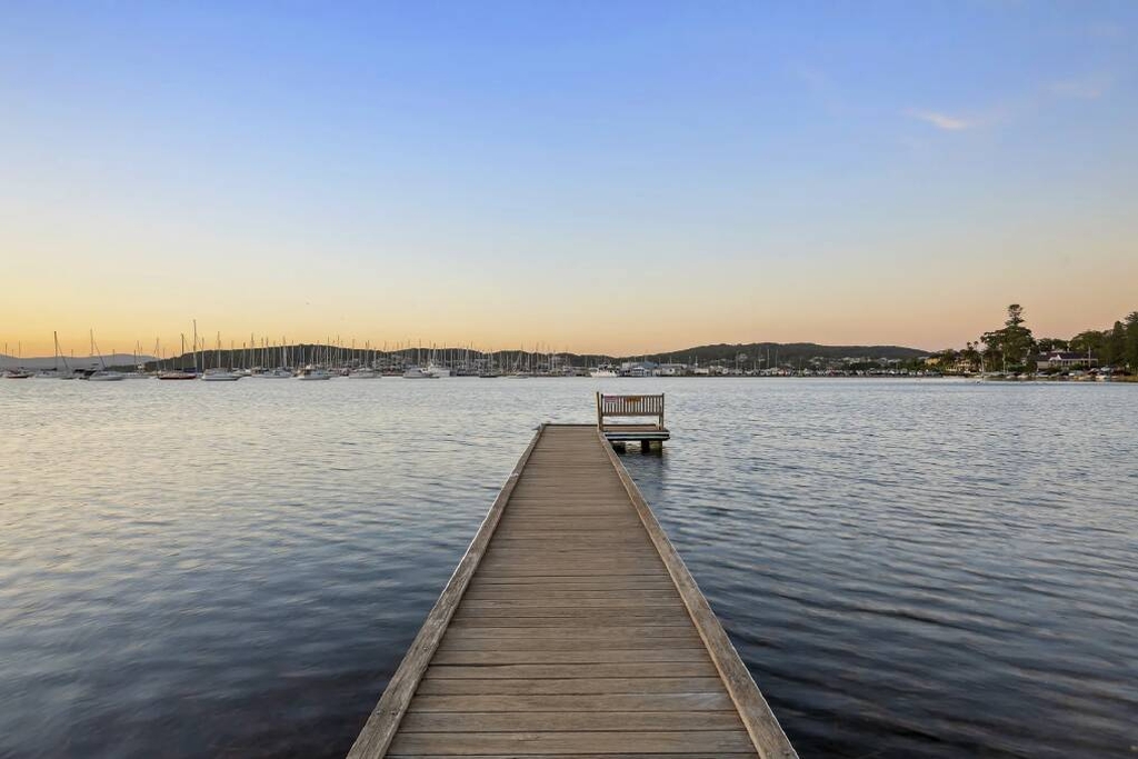 Luxury waterfront home with jetty and guesthouse eyes record price in ...