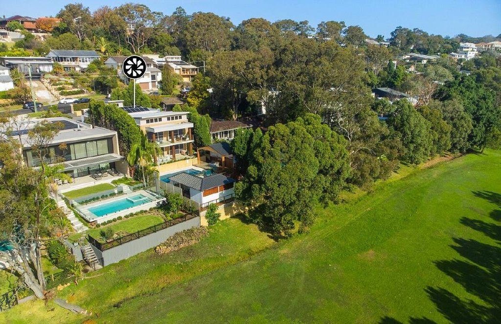 Golf course views, pool, cabana and golf cart bunker - this home has it all