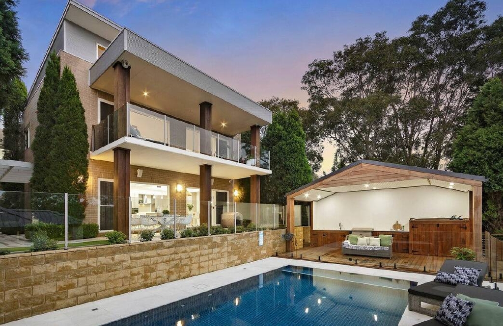 Golf course views, pool, cabana and golf cart bunker - this home has it all