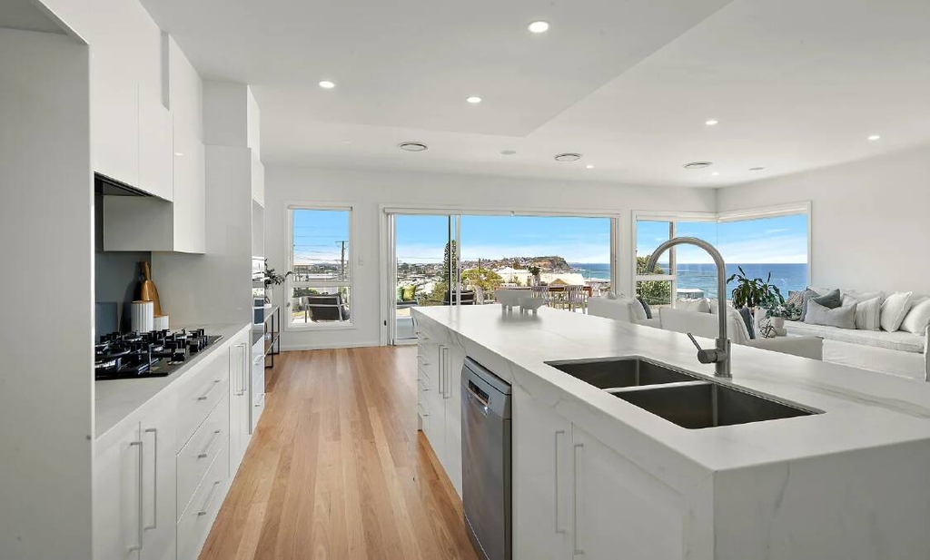 Former Knights player Mark Hughes lists renovated coastal family home