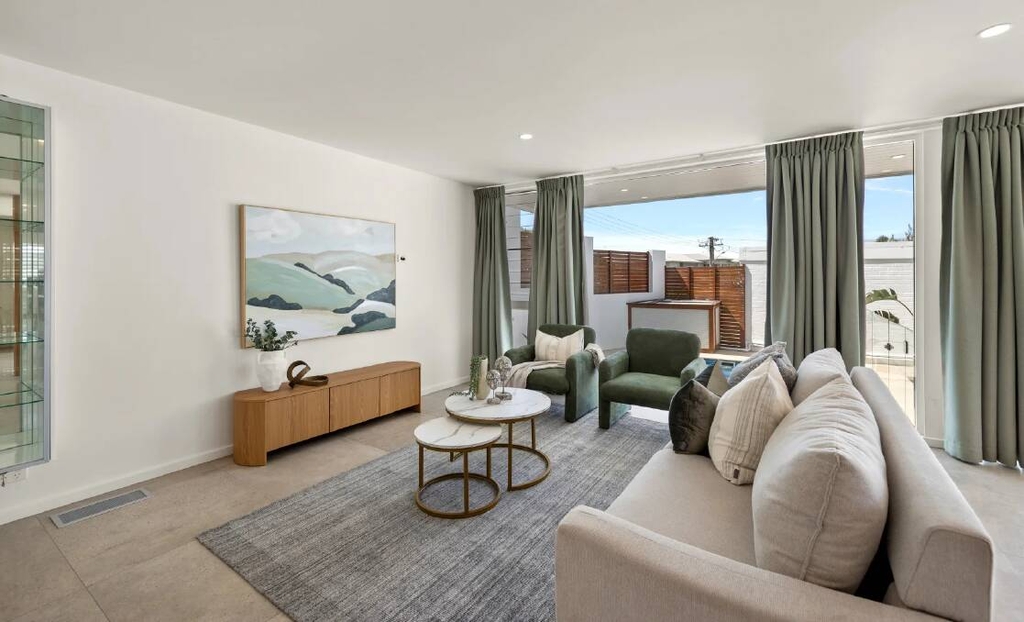 Former Knights player Mark Hughes lists renovated coastal family home