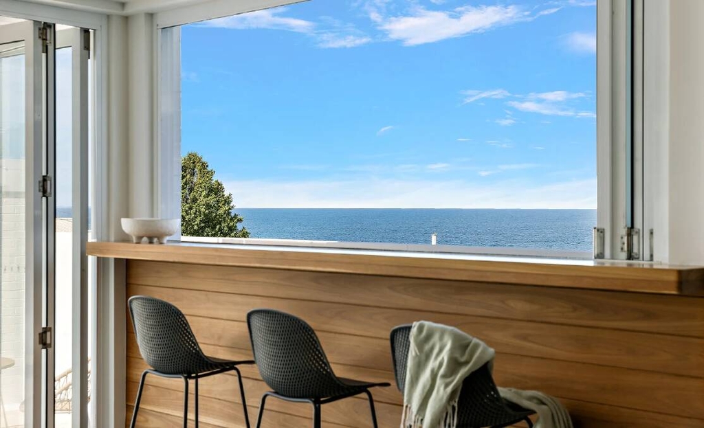 Former Knights player Mark Hughes lists renovated coastal family home